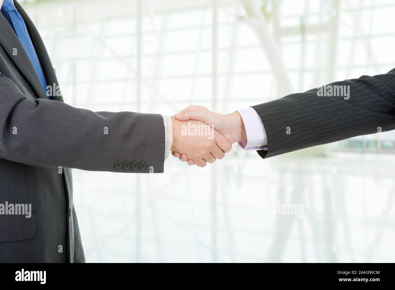Business men hand shake at the office Stock Photo - Alamy