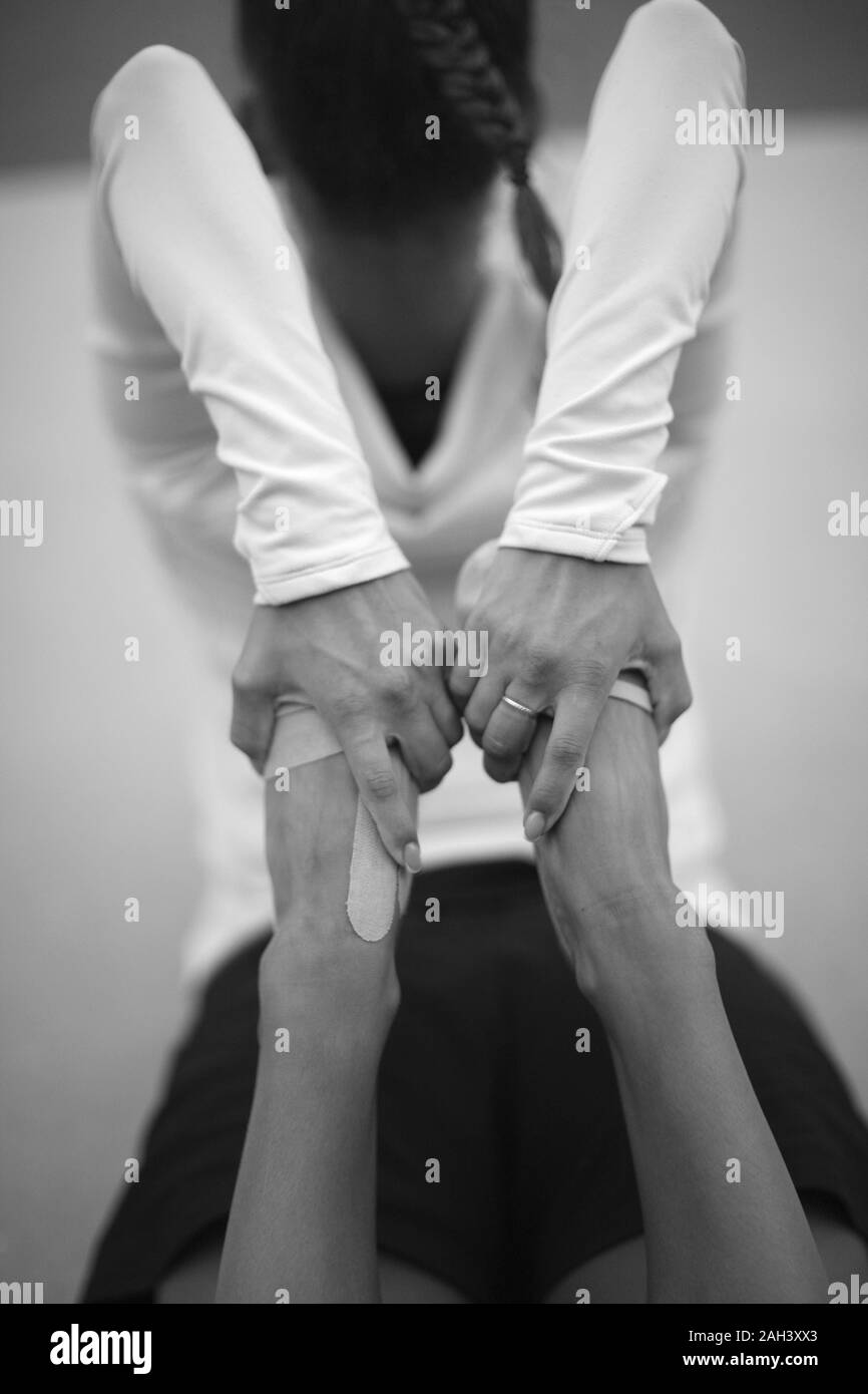 Exercise for stretching the muscles of the back with hands closed and ...