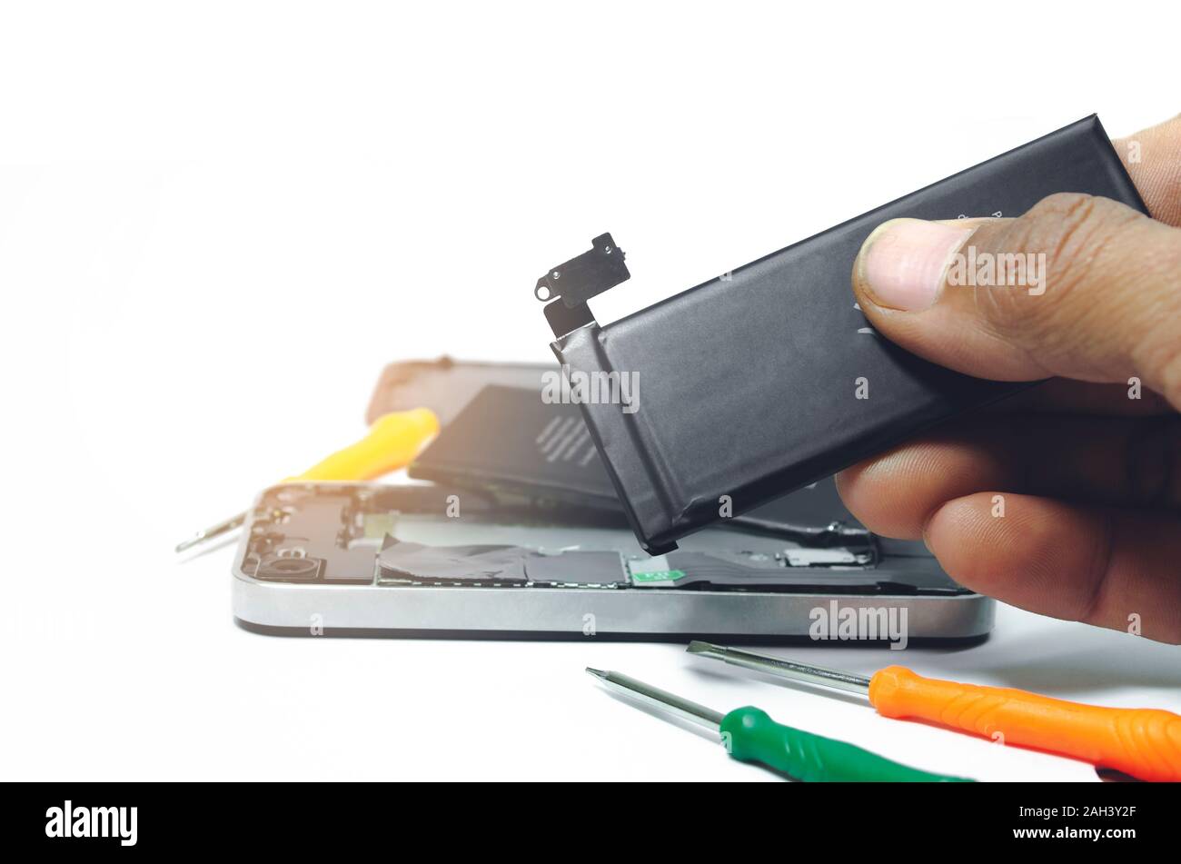 Phone repairs install battery into the motherboard for smartphone By ...