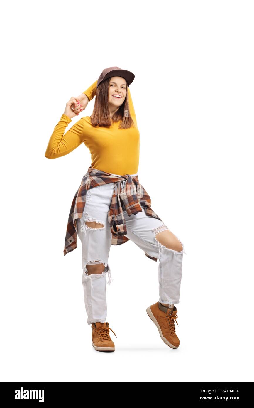 Full length portrait of a young woman in ripped jeans isolated on white ...