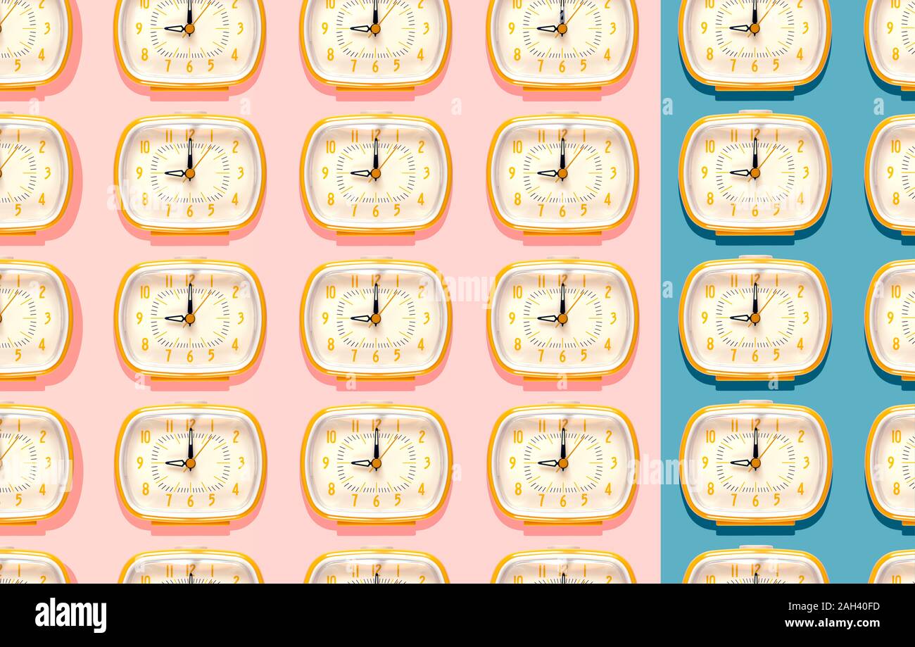 3D Illustration, row of yellow alarm clocks at nine o'clock pattern on ...