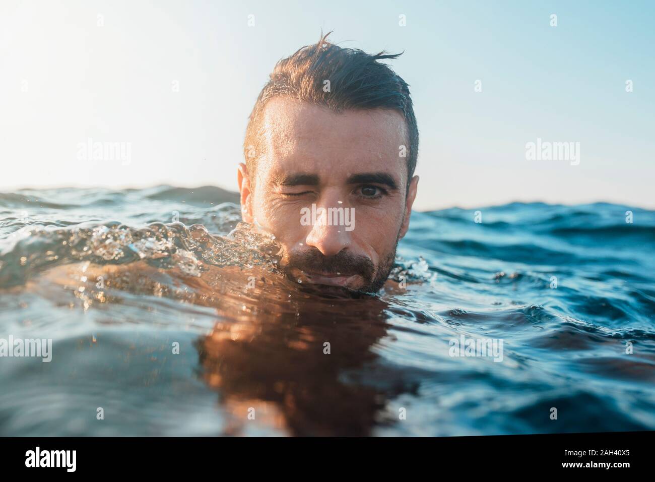 Man Swimming In Ocean