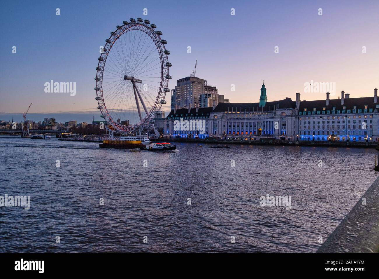 UK, England, London, London Eye and waterfront buildings at dawn Stock ...