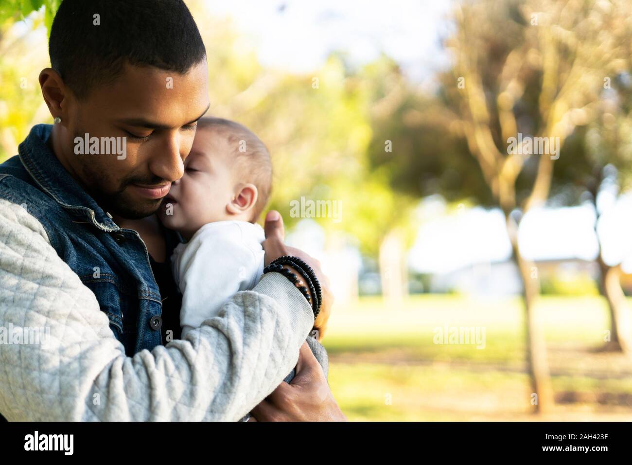 African man carrying baby in hi-res stock photography and images - Alamy