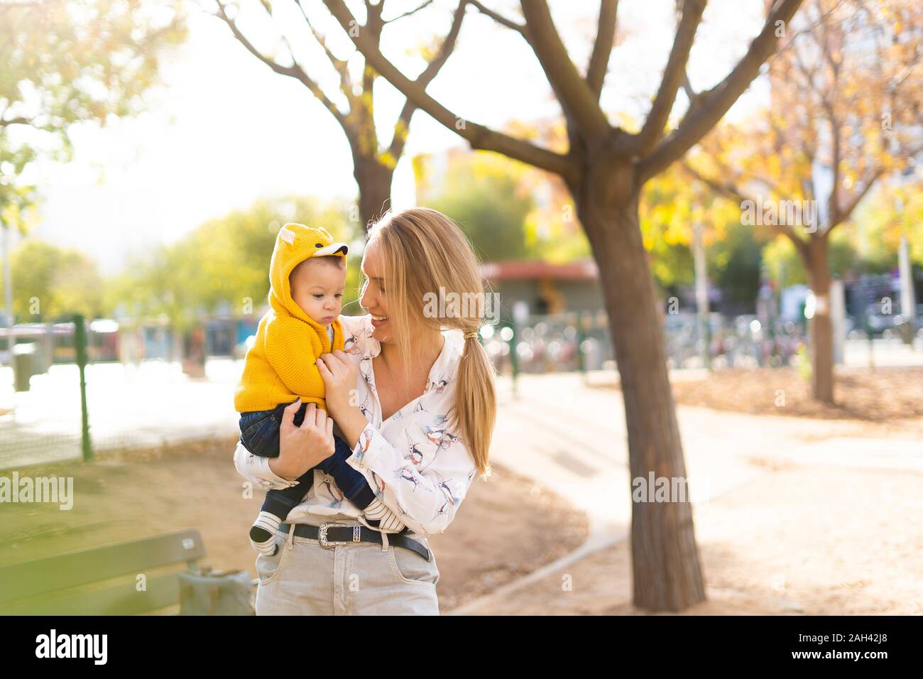 Hooded child in care hi-res stock photography and images - Alamy