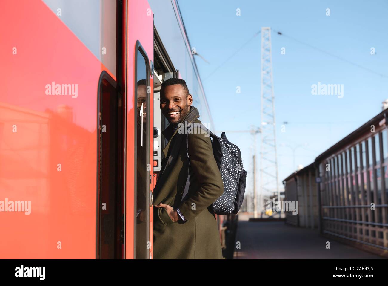 People person entering train hi-res stock photography and images - Alamy