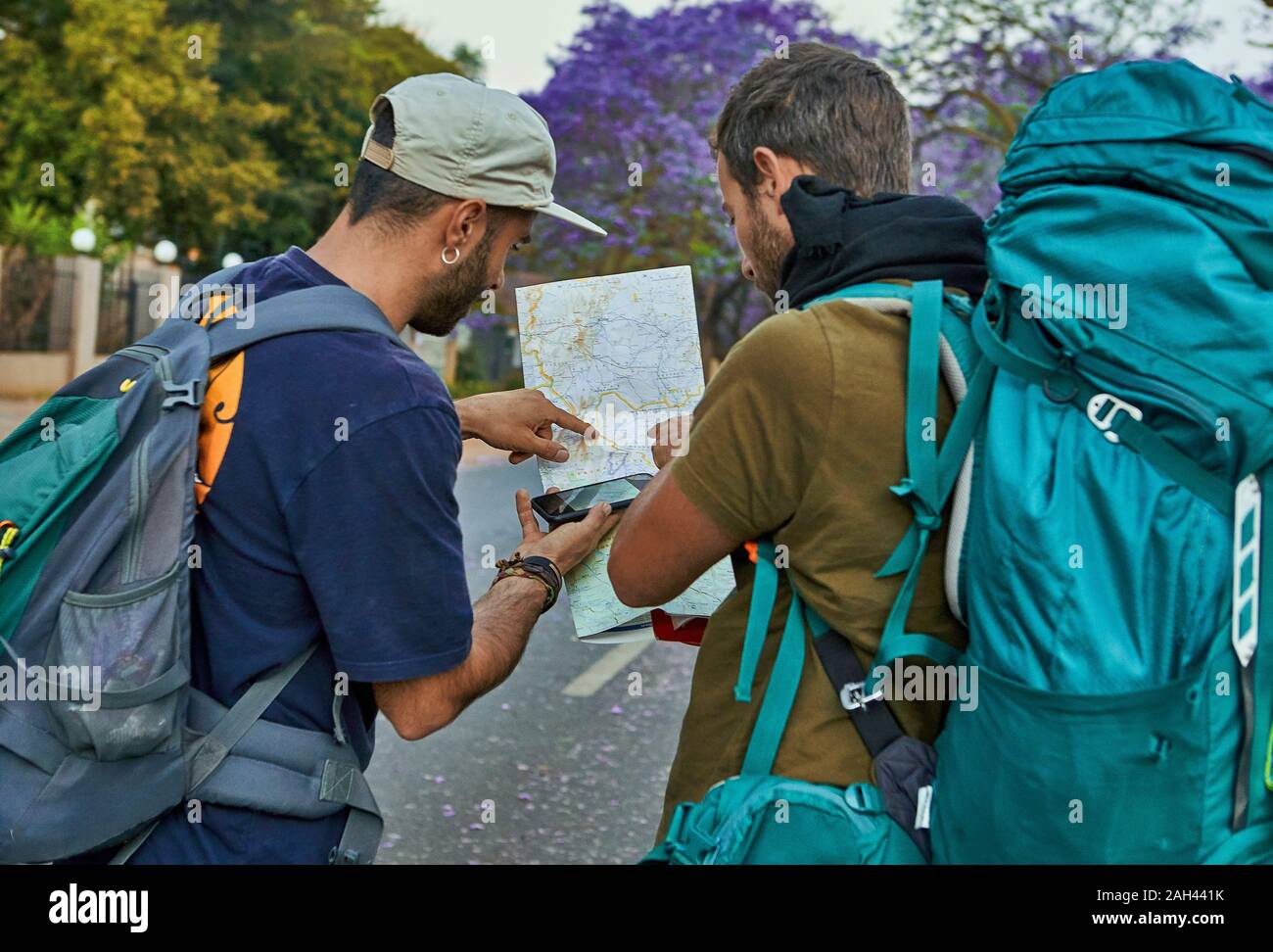 Checking a map hi-res stock photography and images - Alamy