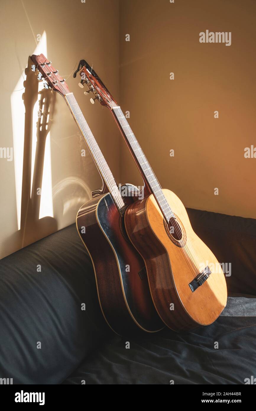 Row acoustic guitars standing in hi-res stock photography and images ...