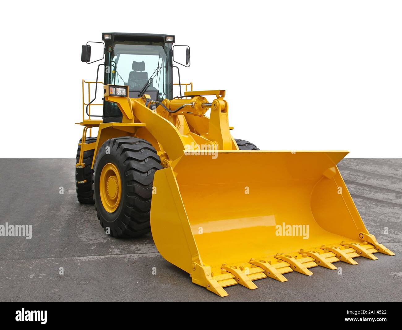 Yellow digger with big bucket Stock Photo - Alamy