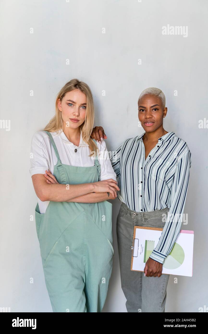 Portrait of two confident women Stock Photo - Alamy