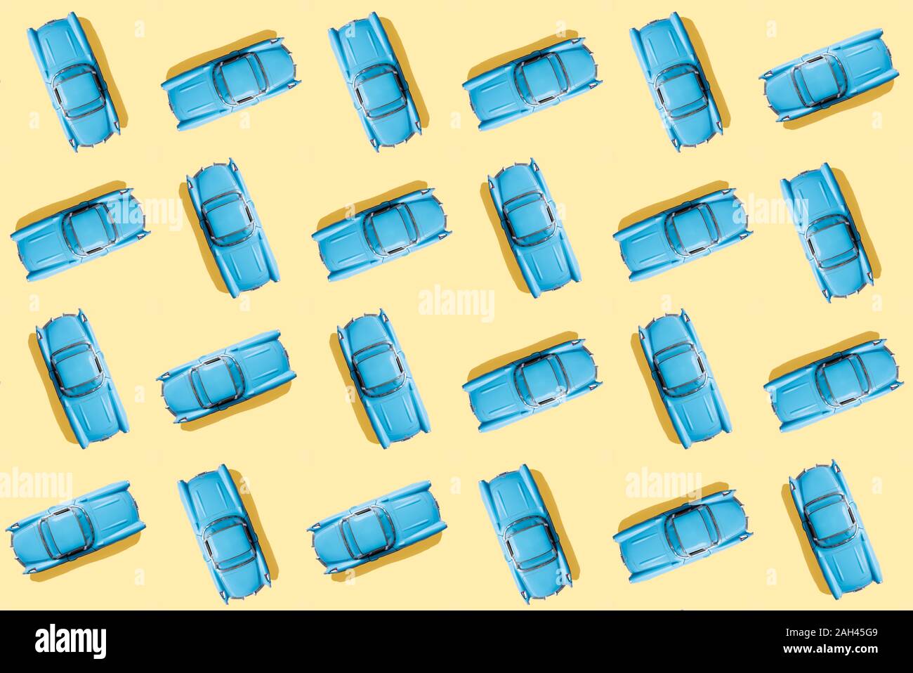 Vintage blue cars pattern on pastel yellow background Stock Photo - Alamy