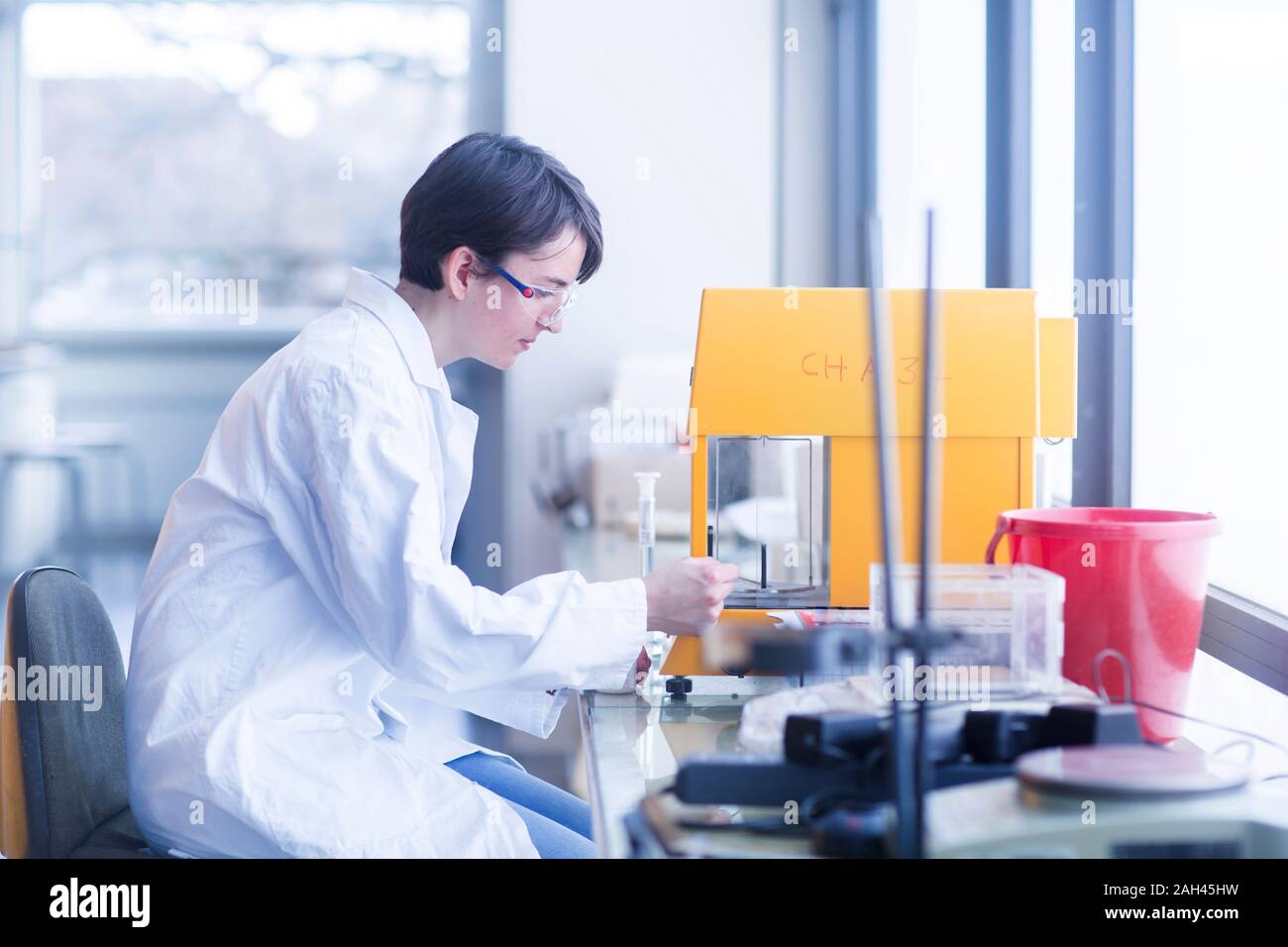 Female chemist at work Stock Photo - Alamy
