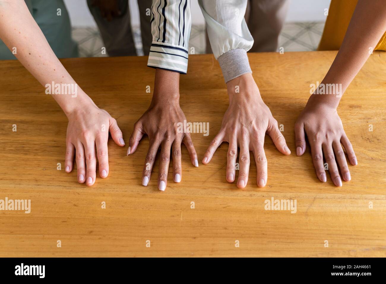 Hands only multiracial hi-res stock photography and images - Alamy
