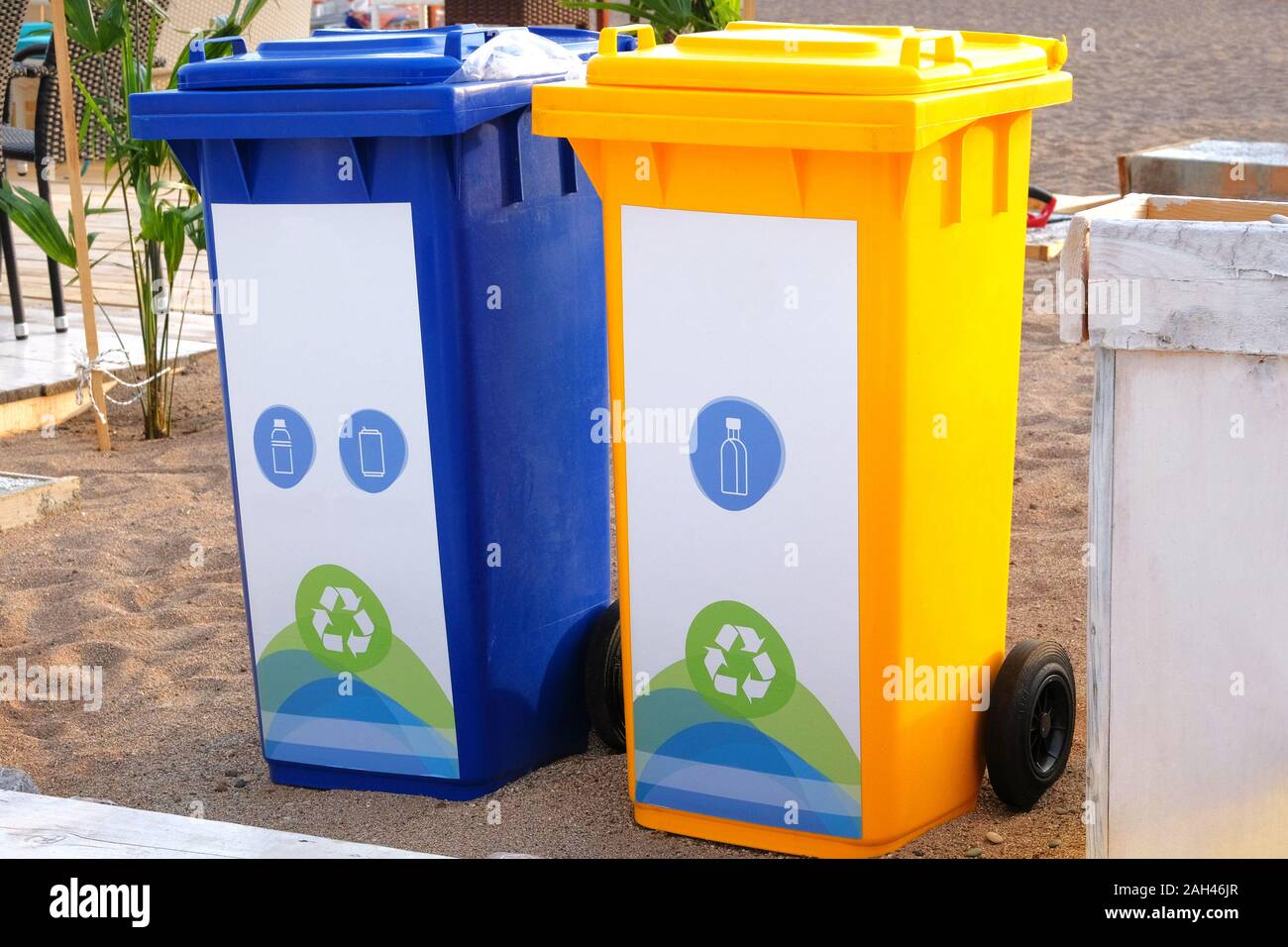 Blue and yellow containers for further processing of garbage. Garbage ...