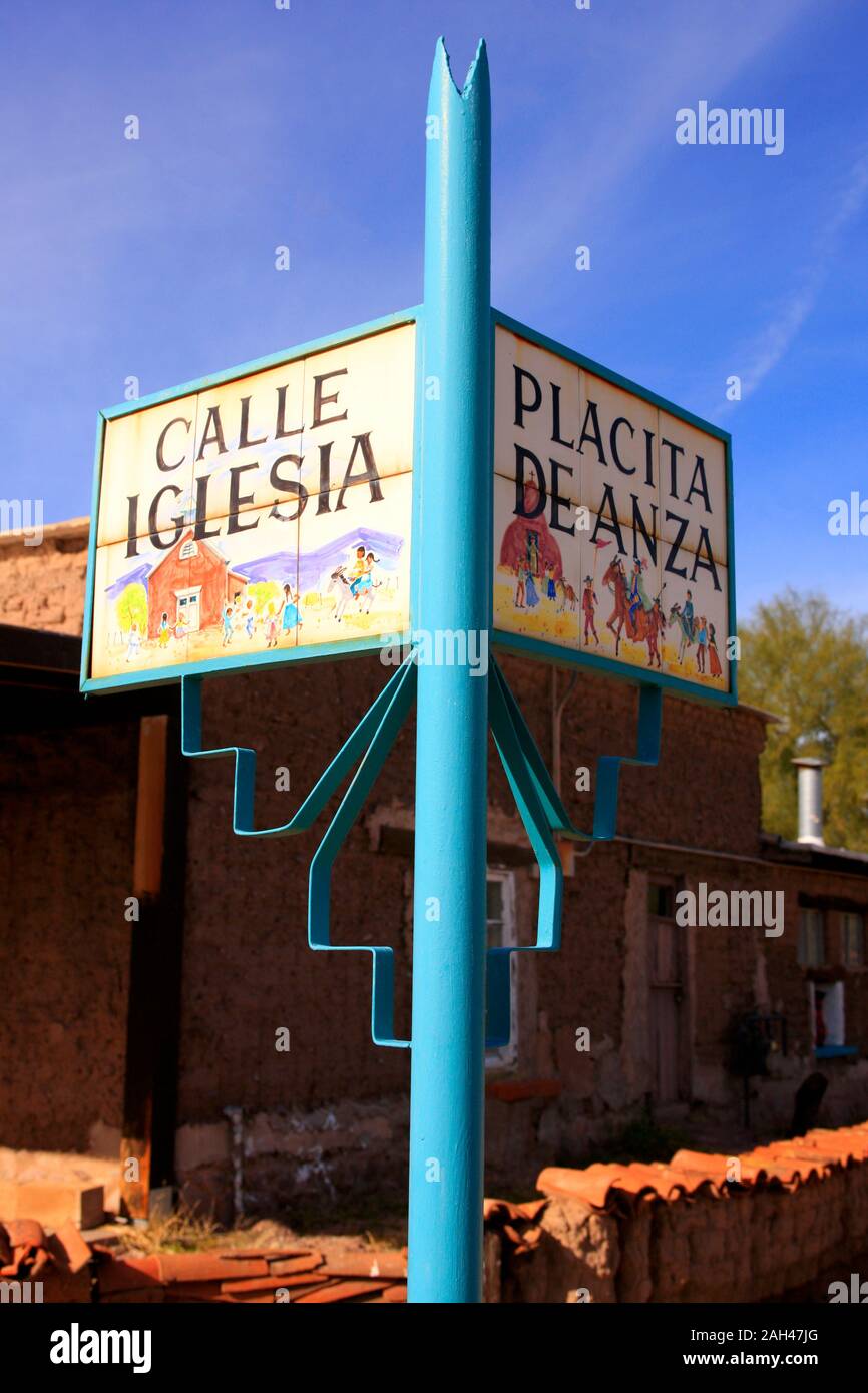 Ceramic tile street sign at the corner of Calle Iglesia and Placita de ...