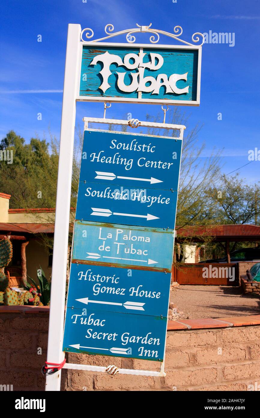 Old Tubac sign with directions to different businesses in the small ...
