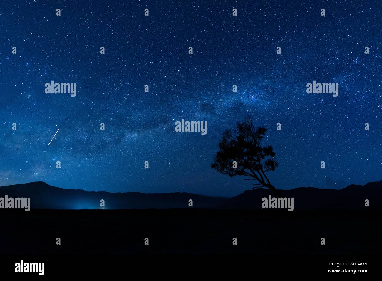 Indonesia, East Java, Milky Way galaxy on blue starry night sky over ...