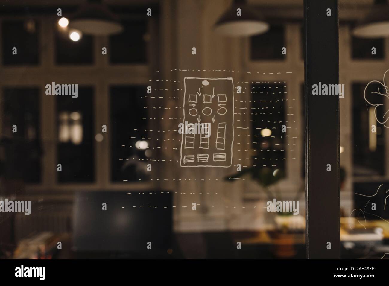 Drawing at a glass pane in office Stock Photo - Alamy