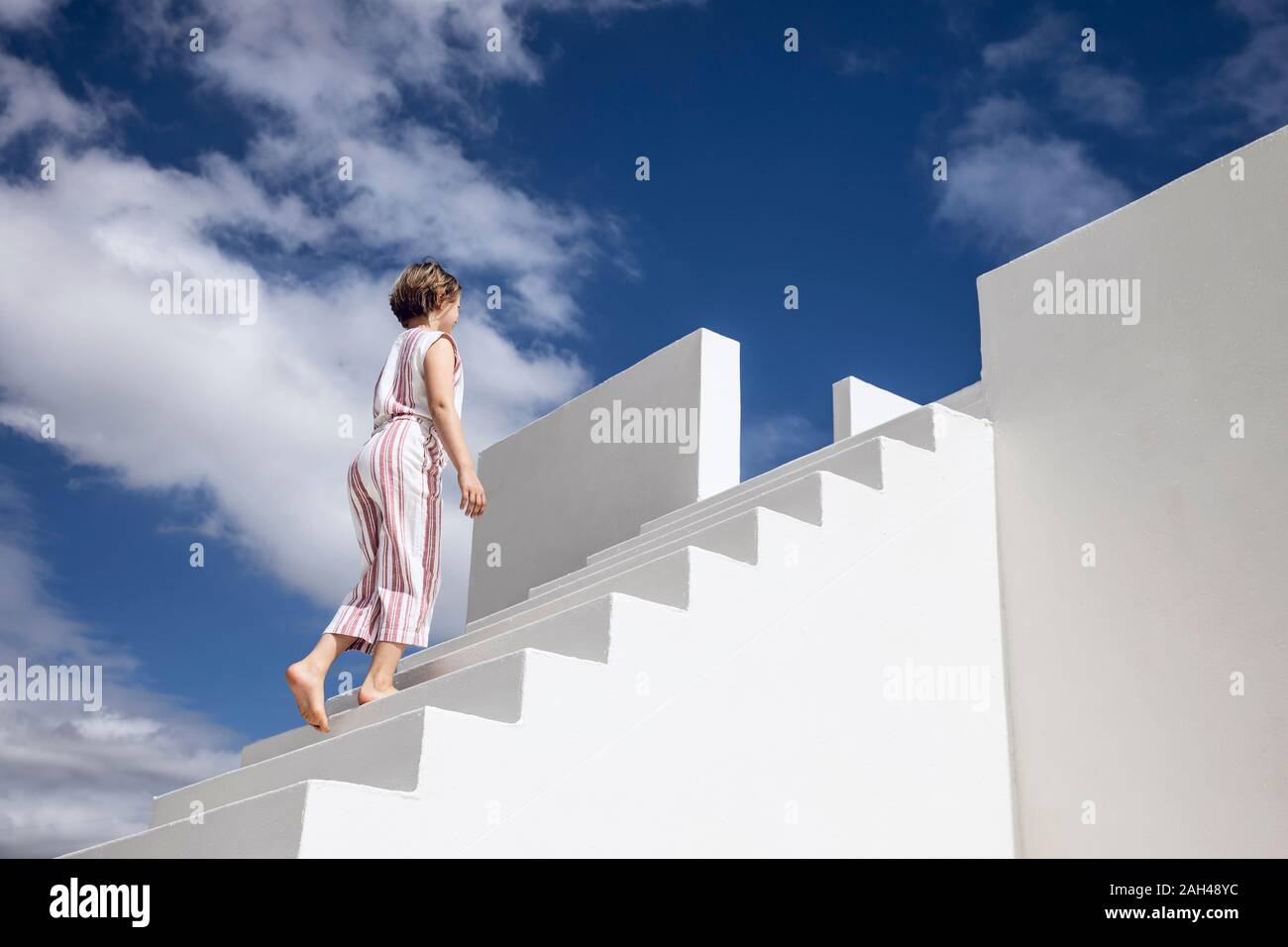 Child climbing stairs hi-res stock photography and images - Alamy
