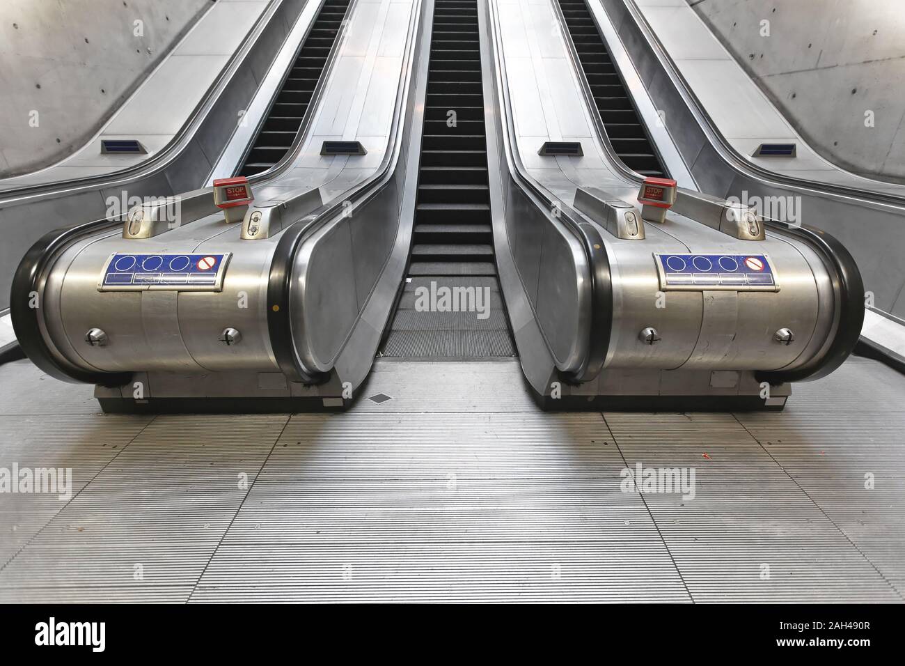 Three underground escalators in parallel layout Stock Photo - Alamy