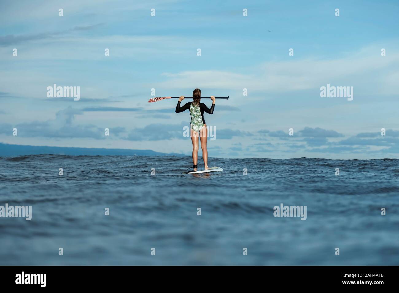 Female SUP surfer, Bali, Indonesia Stock Photo - Alamy