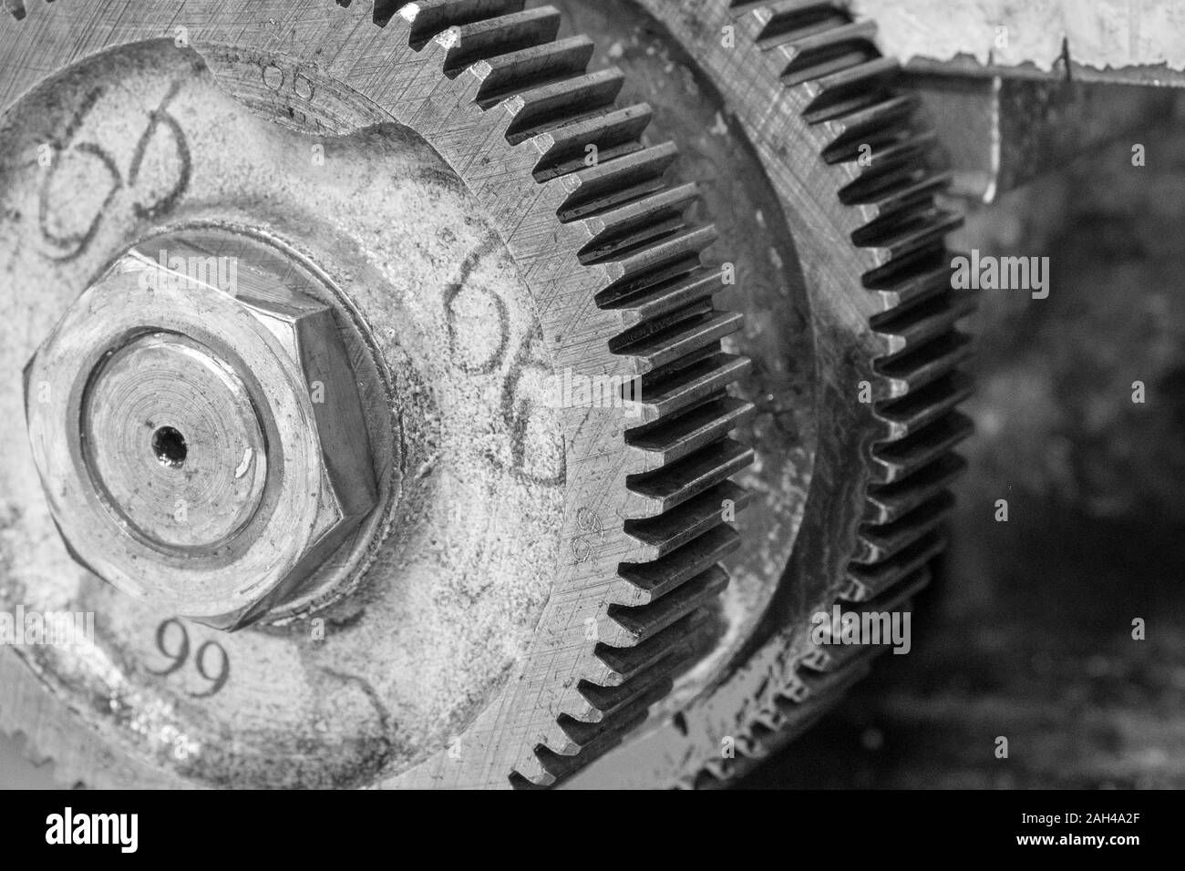metal cog wheels in gearing at gear box Stock Photo - Alamy
