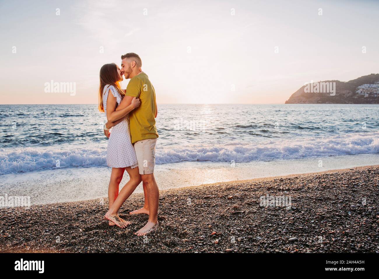Affection beach couple kissing romance hi-res stock photography and ...