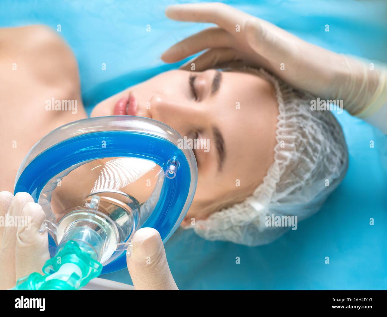 Portrait of a patient in operative room. Focus on the mask, blurred ...