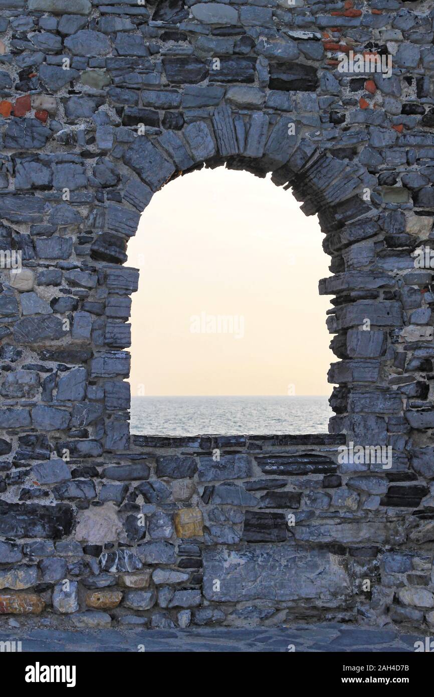 Arch stone window with Mediterranean sea view Stock Photo - Alamy