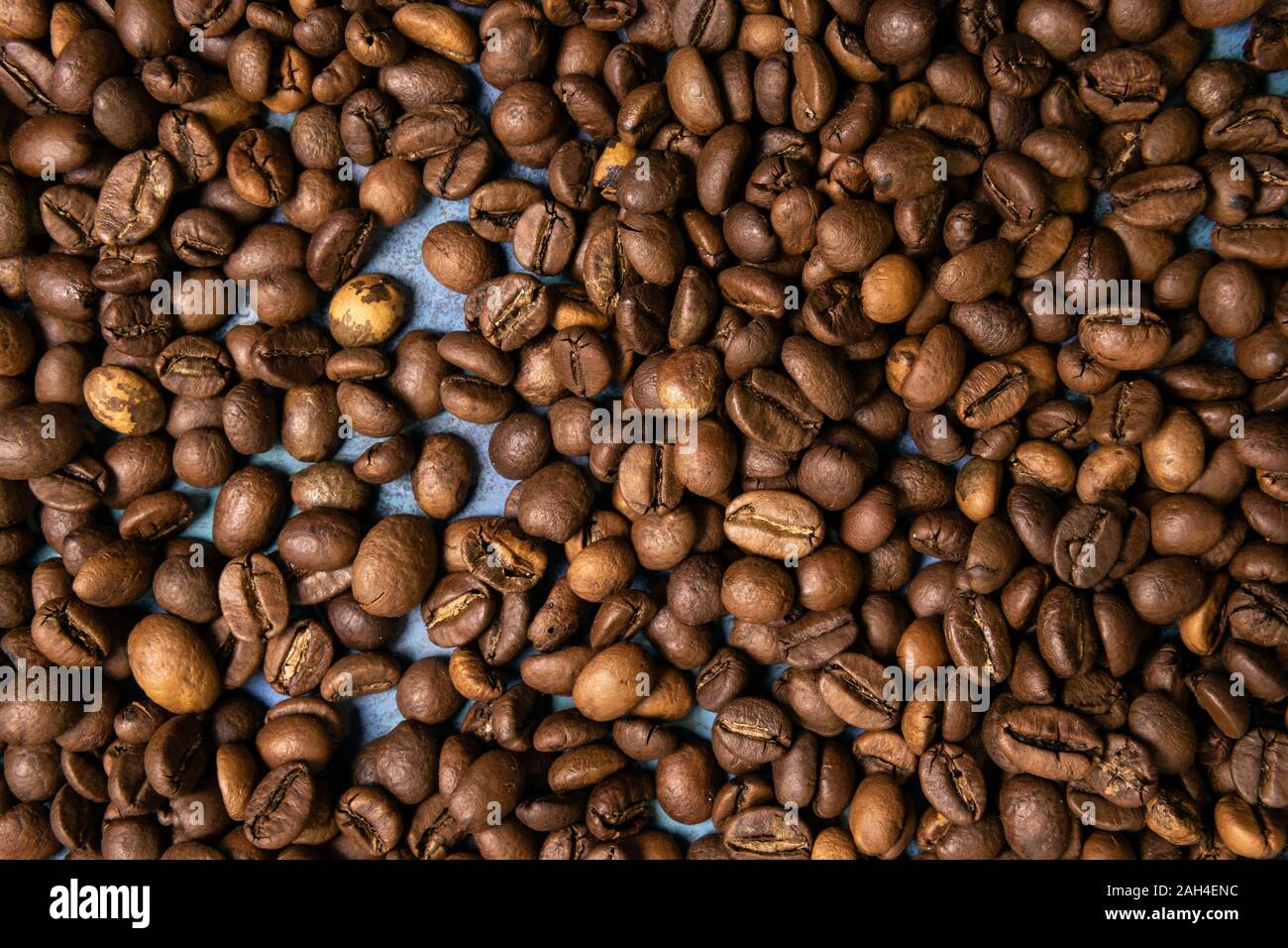 dark roasted ready fresh coffee beans in bulk Stock Photo - Alamy