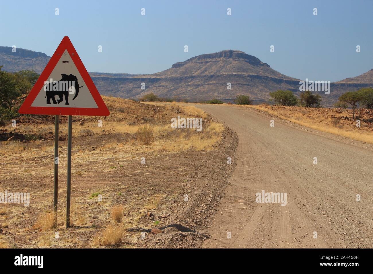 Warning sign in Namibia: elephant crossing Stock Photo - Alamy