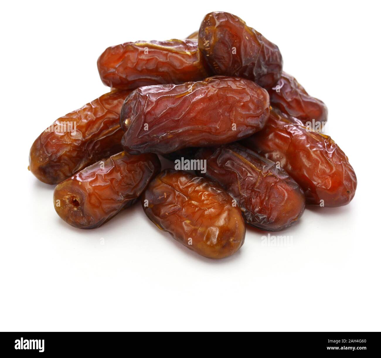 iranian piarom dates isolated on white background Stock Photo - Alamy