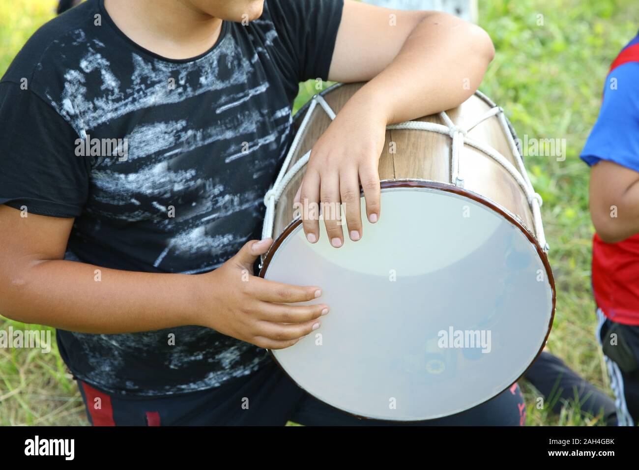 Young azeri guys playing traditional drum nagara on the holiday of ...