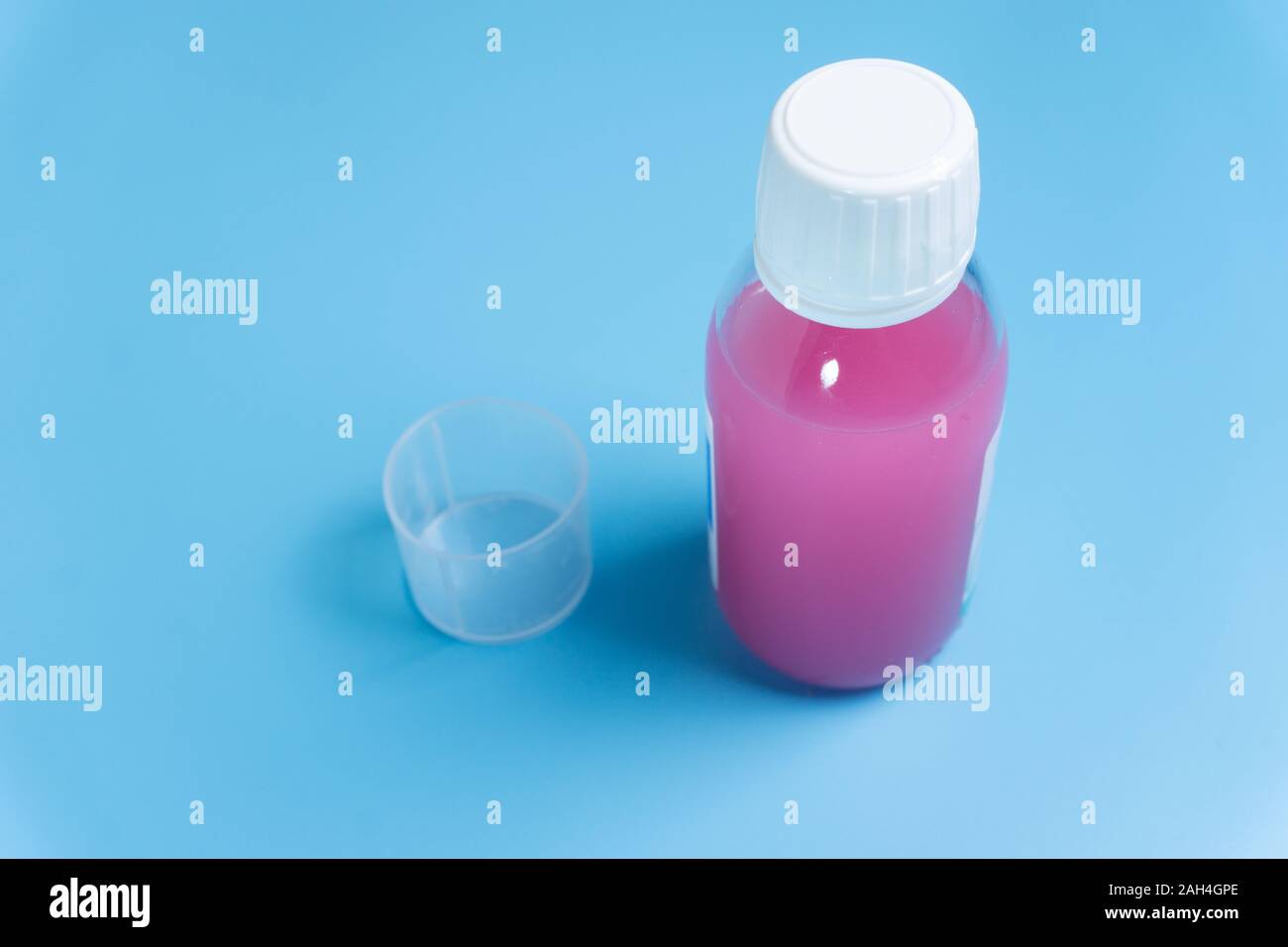 Syrup in a bottle Stock Photo - Alamy