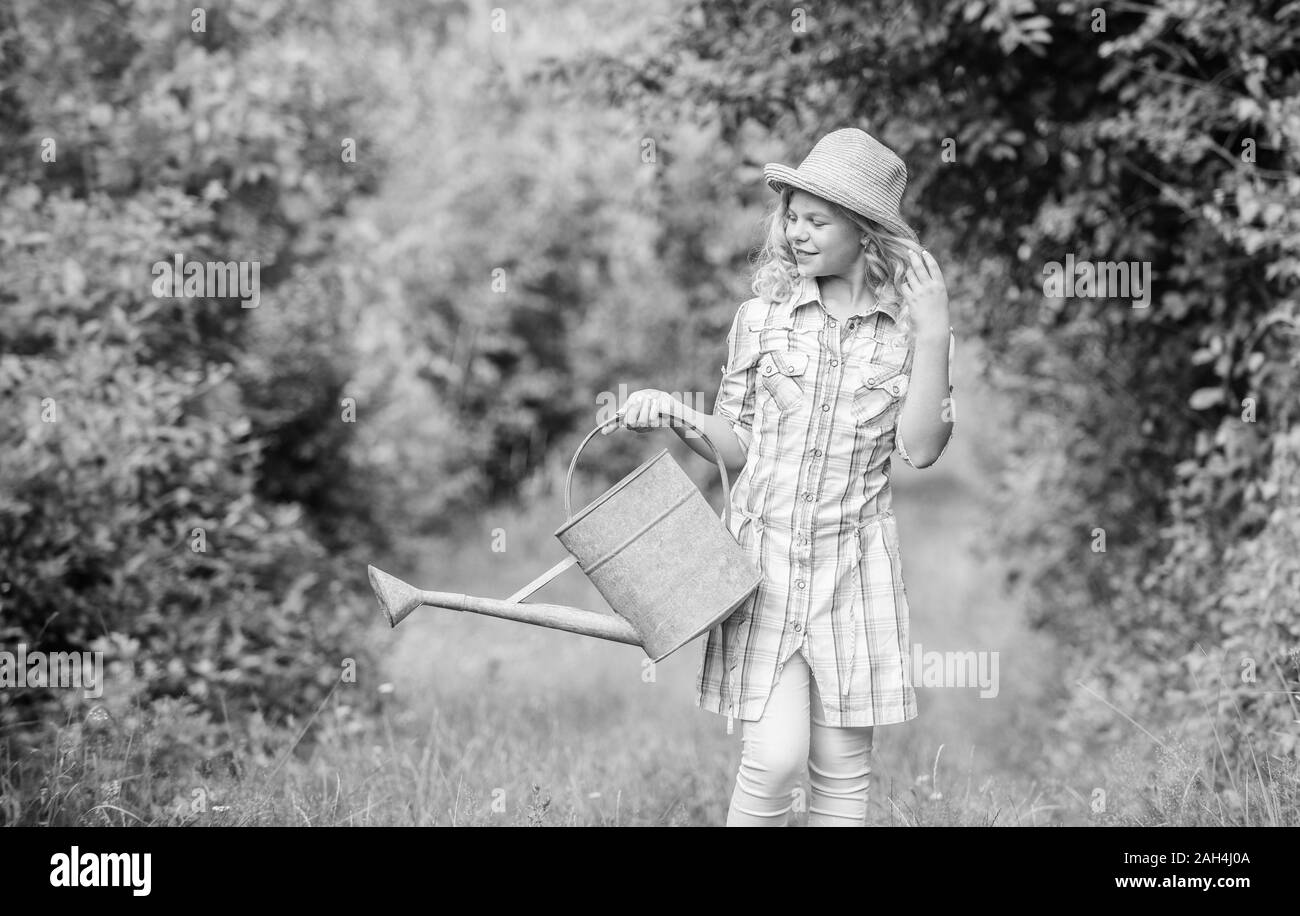 Watering tools. Girl child hold watering can. Spring gardening ...