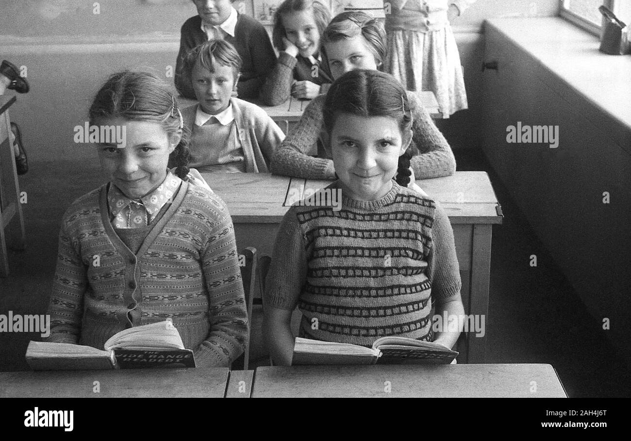 1950s, historical, primary school children in a classroom with two ...