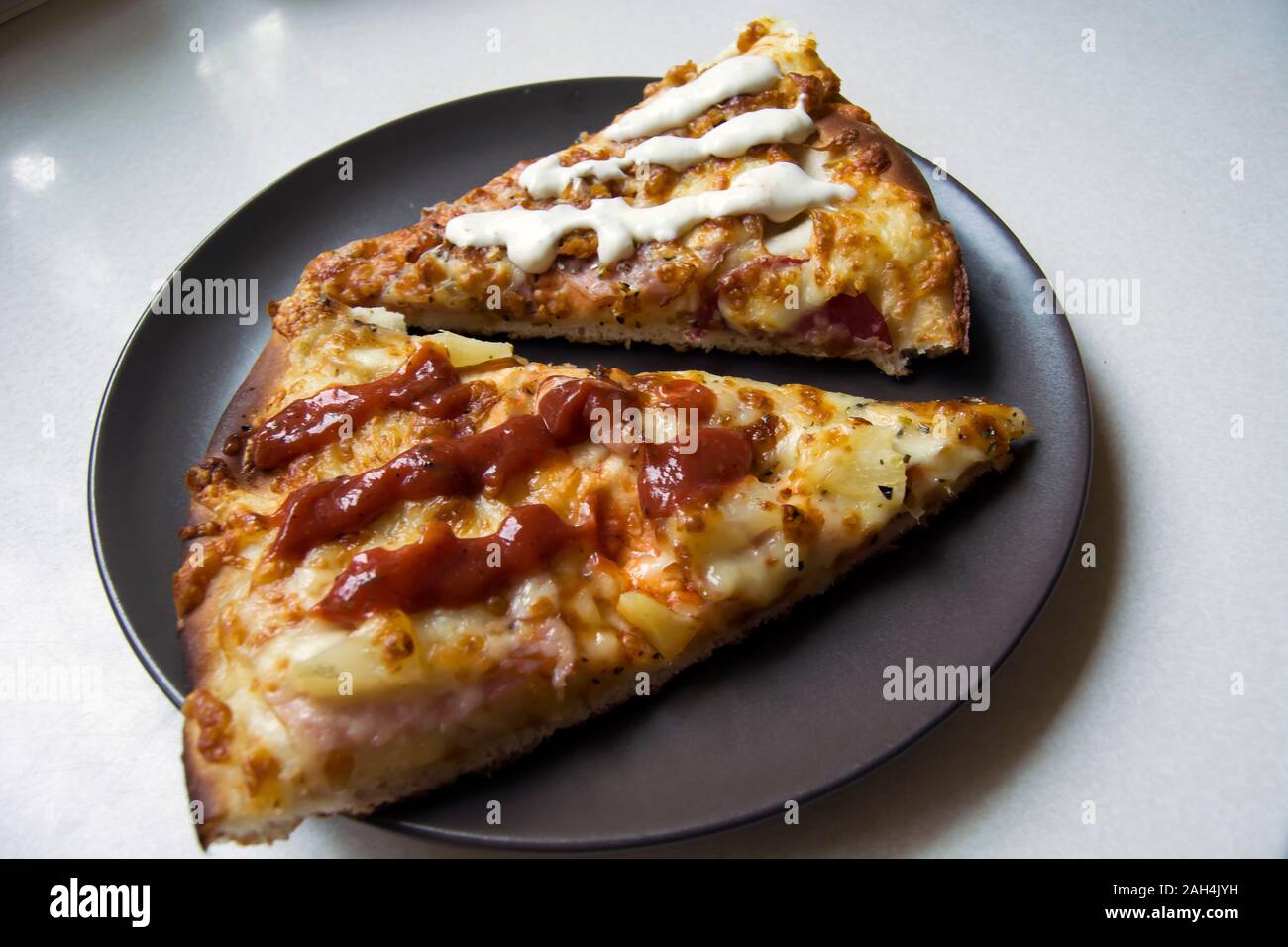 Two pizza slices hi-res stock photography and images - Alamy