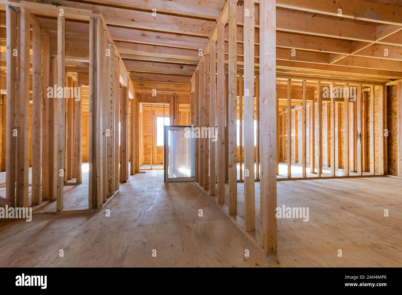 Interior view of a house under construction home framing Stock Photo ...