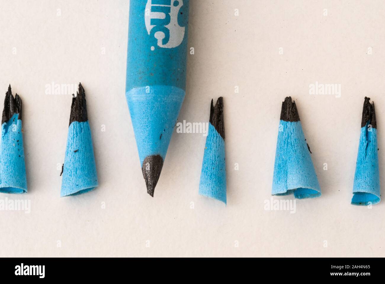 Many wooden crayons as macro image, white background, close up Stock ...