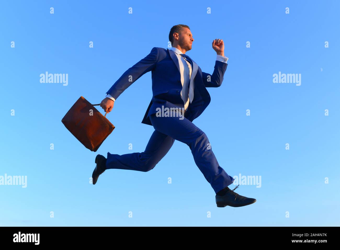 Businessman makes big step up on career ladder. Business and success ...