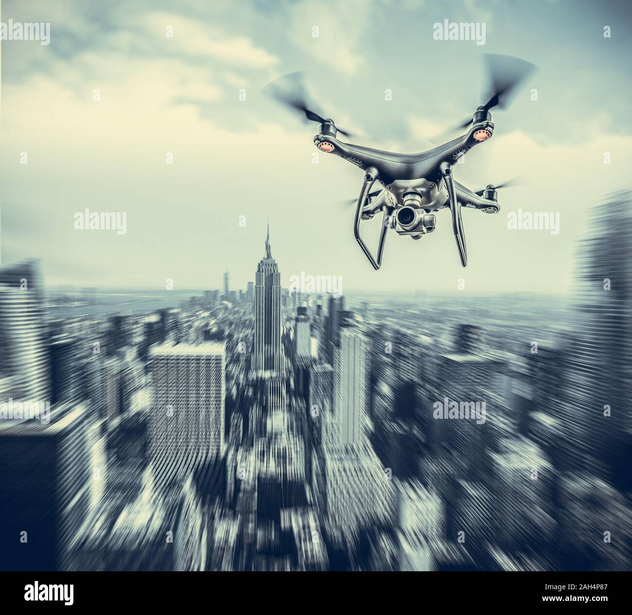 Drone flying in the big city Stock Photo - Alamy