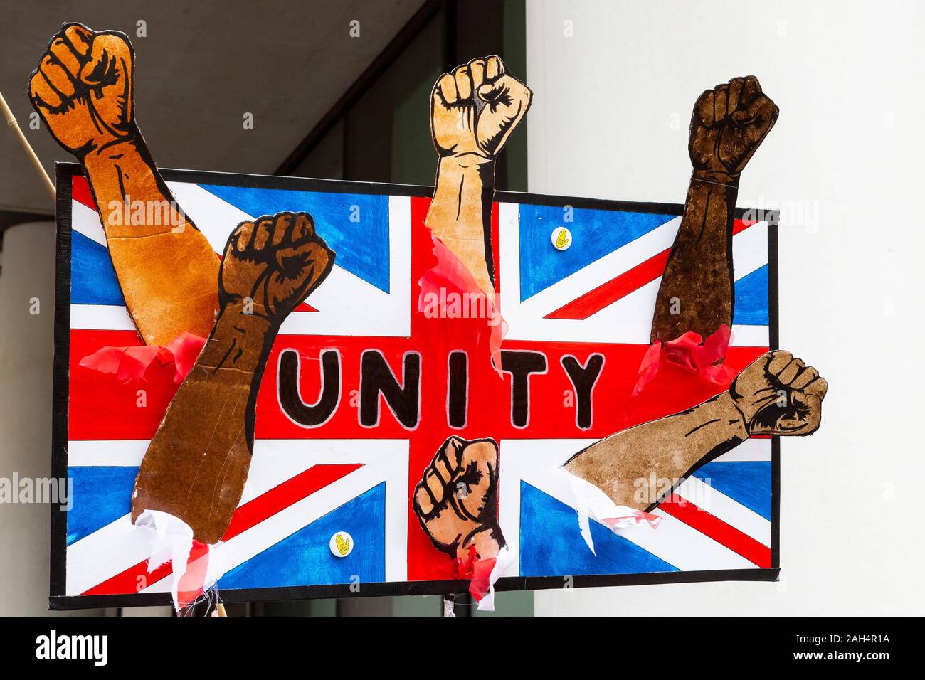 Union Flag with the word Unity at the Tories Out Protest in London ...