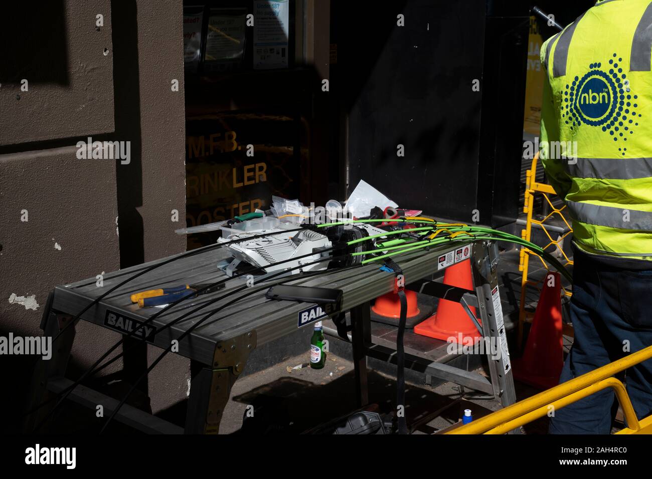 A technician sets up his bench to work on Melbourne's NBN ...