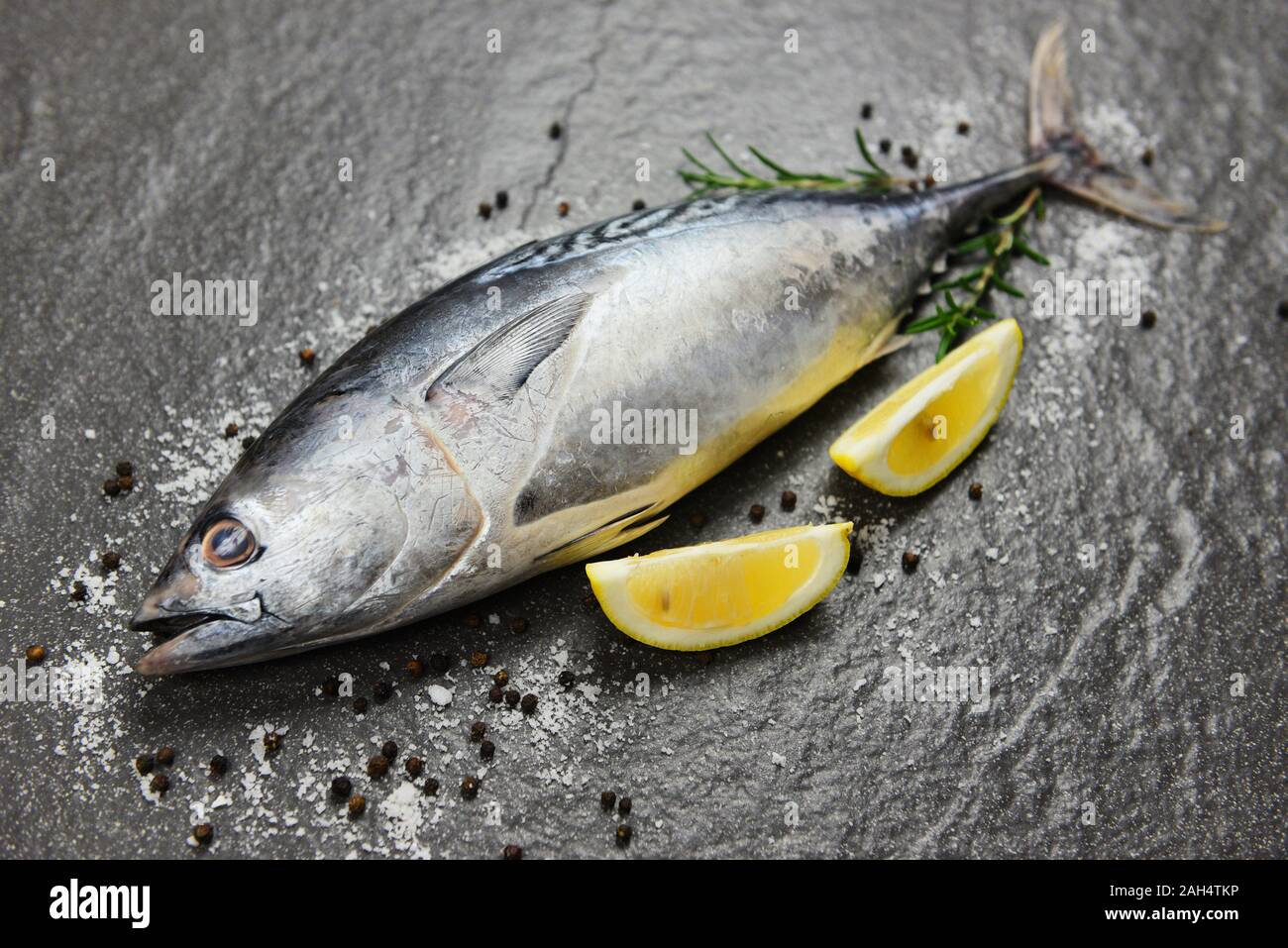 Fresh fish with herbs spices rosemary and lemon / Raw fish seafood on ...