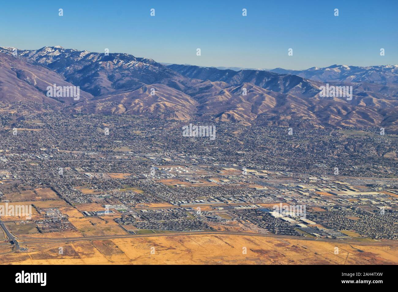 Wasatch Front Rocky Mountain Range Aerial view from airplane in fall ...