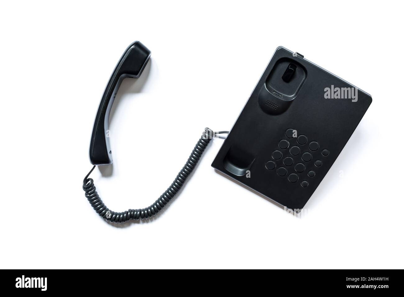 Telephone of black color with a picked up handset and erased numbers ...