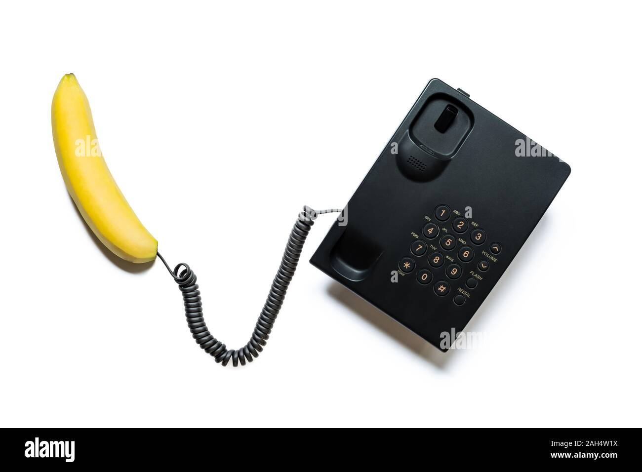 Creative photo of a simple modern black push-button telephone with a ...