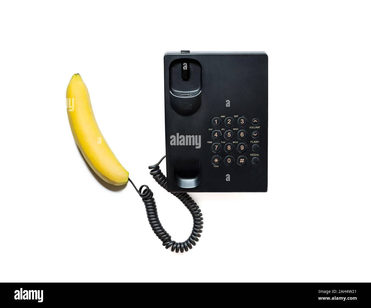 Creative photo of a simple modern black push-button telephone with a ...