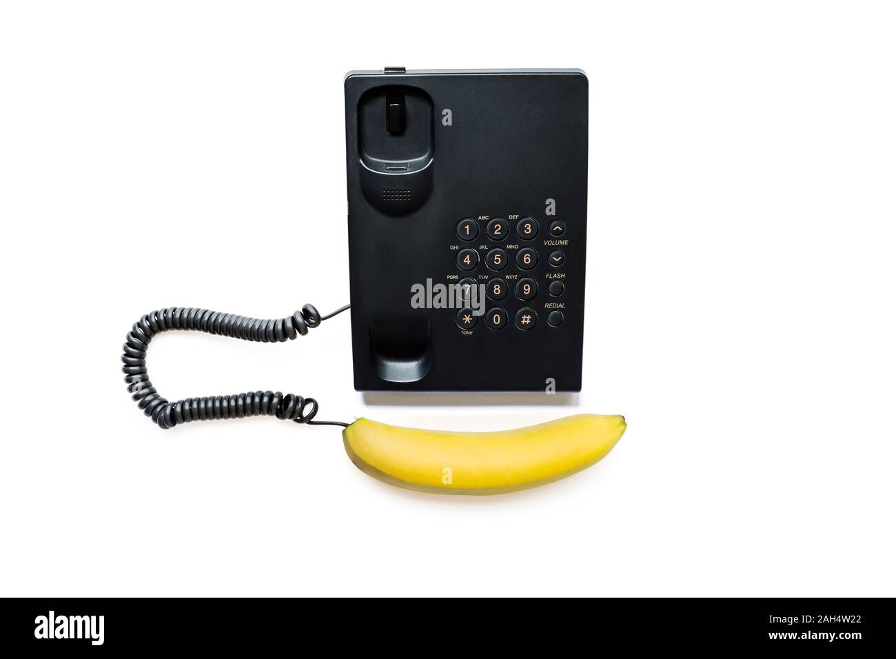 Creative photo of a simple modern black push-button telephone with a ...