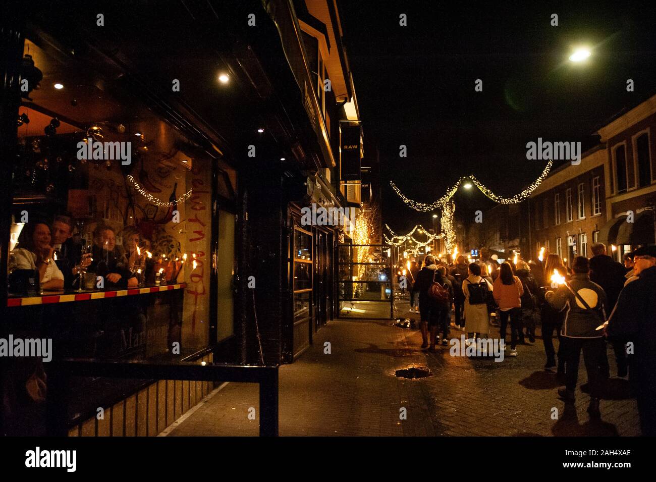 People walking with torches during the torchlight procession.Thousands ...